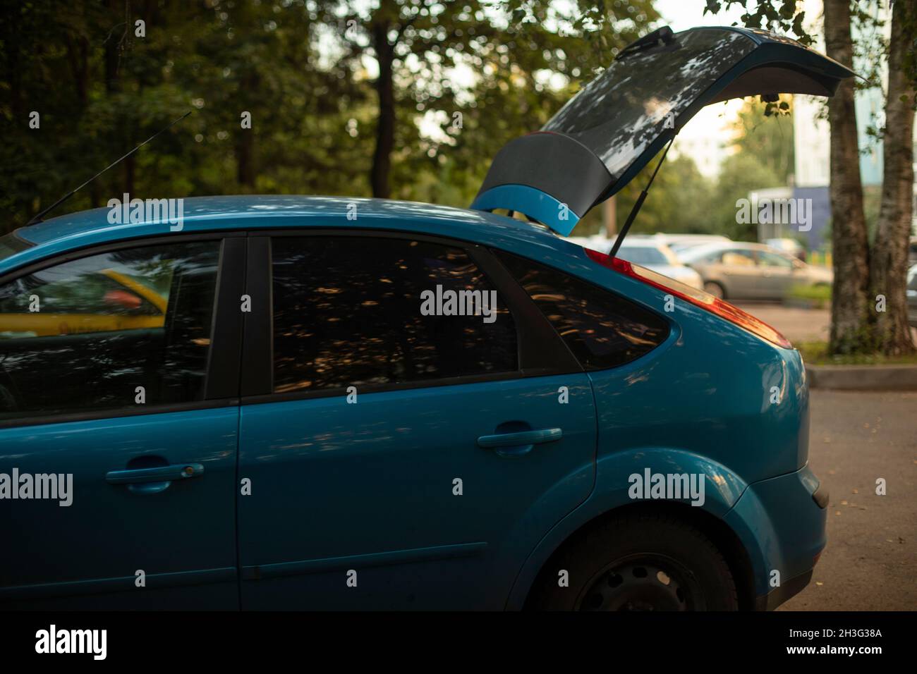 Open car. Back door of transport. The car is in the parking lot Stock ...