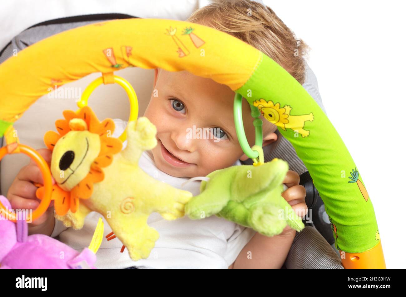 Happy baby in stroller Stock Photo - Alamy