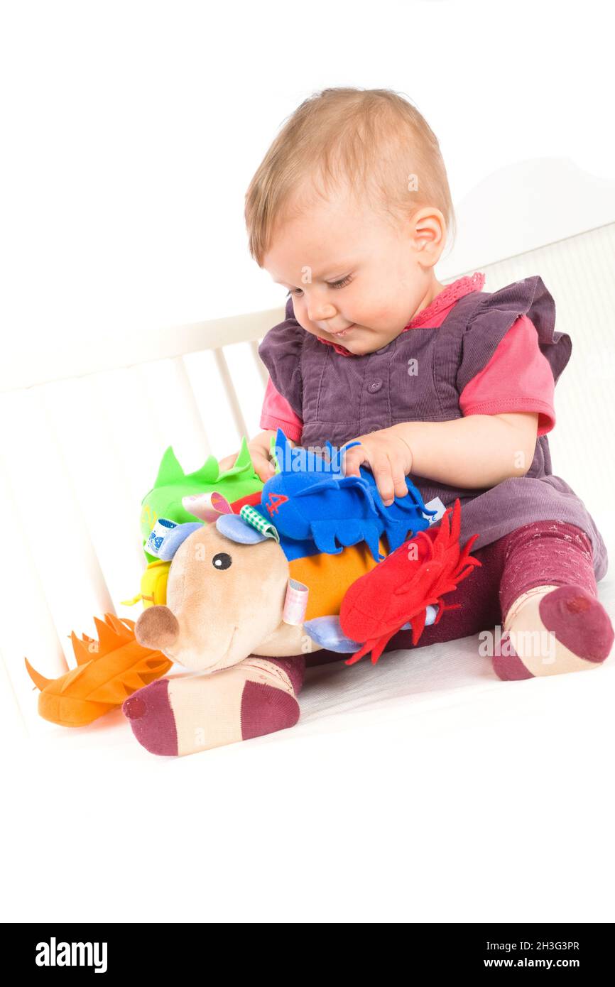 Baby girl home playing Cut Out Stock Images & Pictures - Alamy