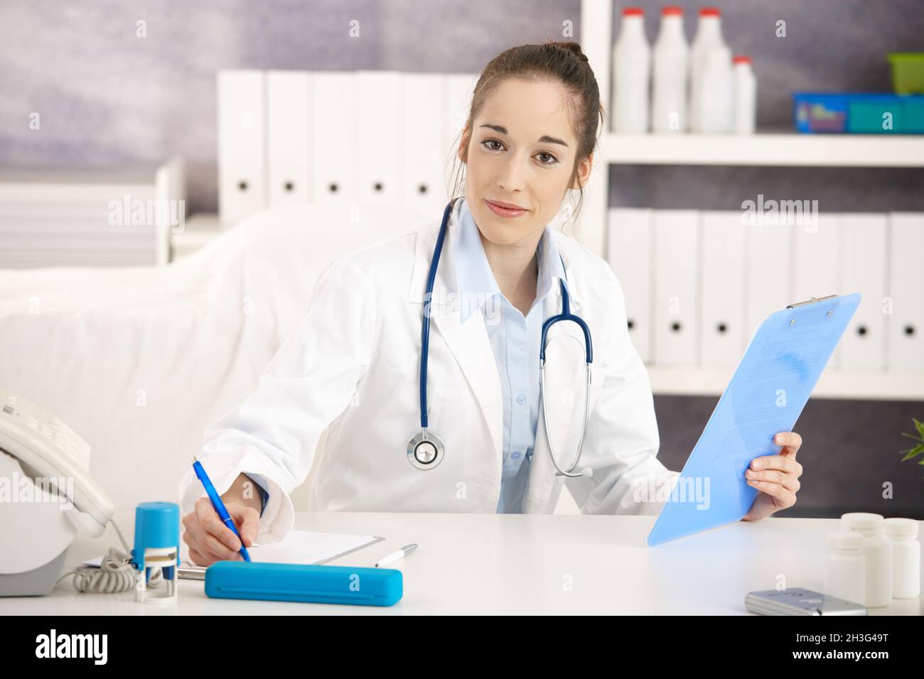 Young female professionals doing hi-res stock photography and images ...