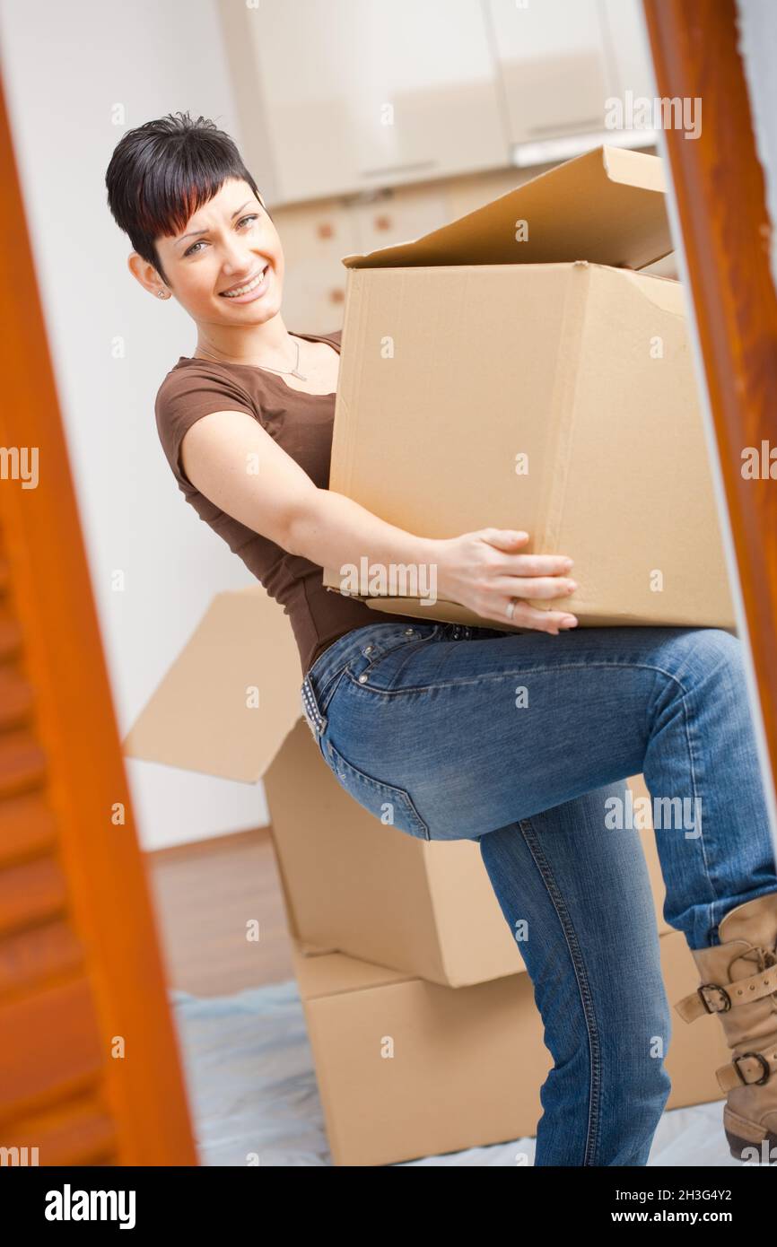Lifting cardboard hi-res stock photography and images - Alamy