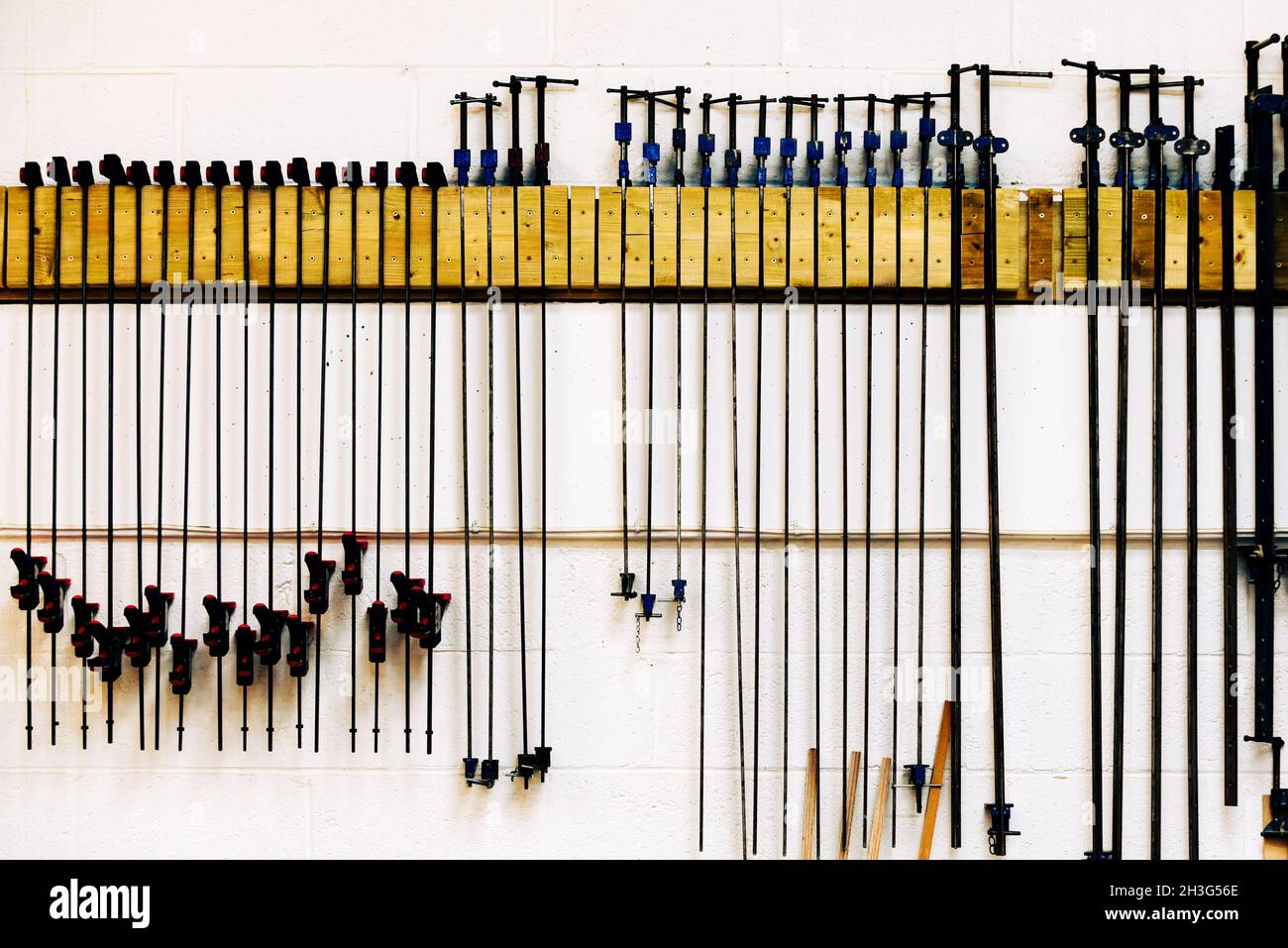 Vice and clamps for woodwork make an abstract industrial background ...