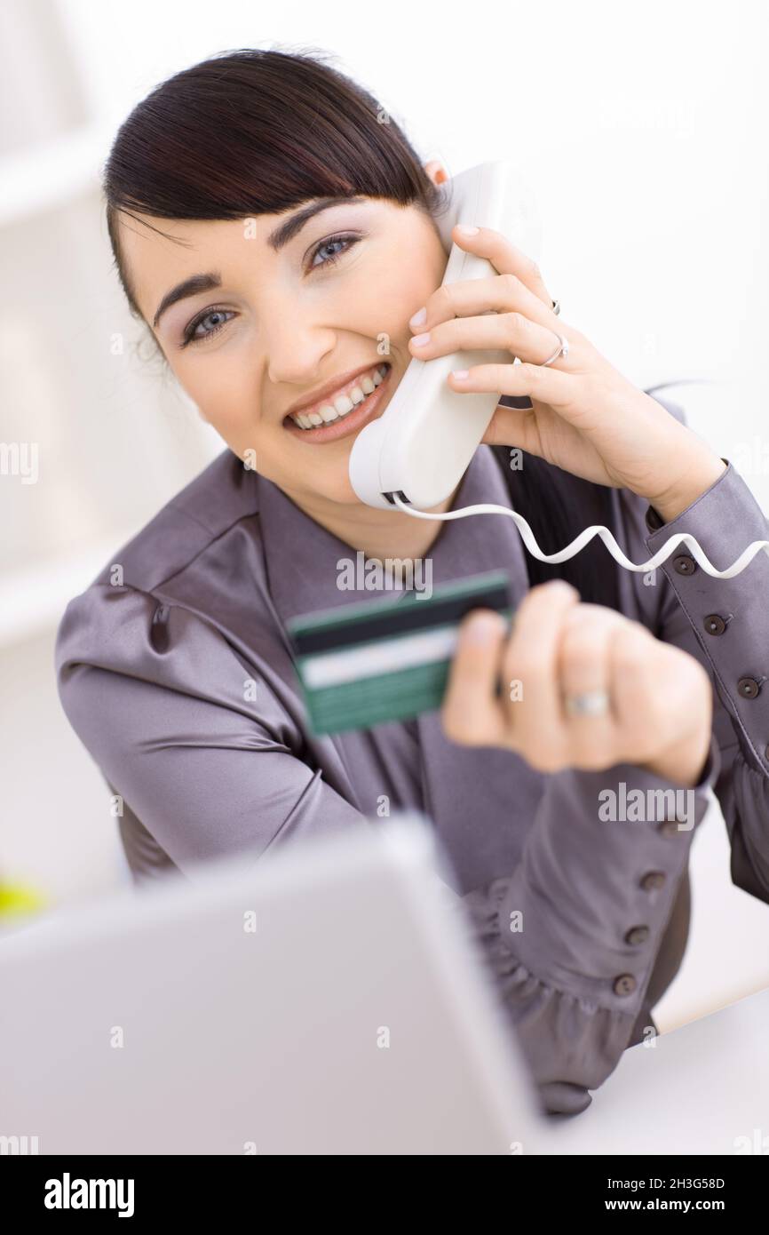Businessperson shopping online using hi-res stock photography and ...