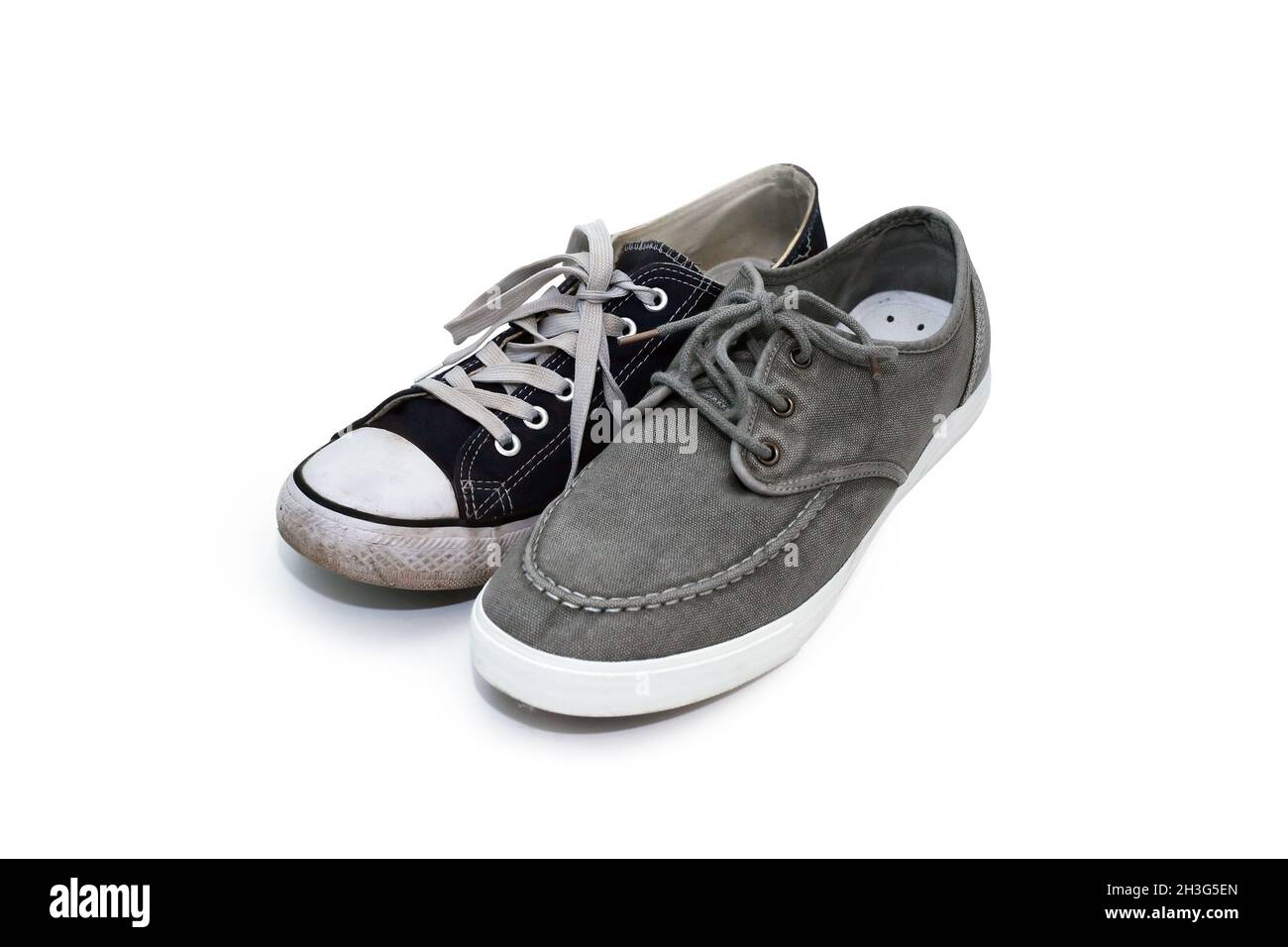 Pair of walking shoes. One is old and dirty and another is new Stock ...