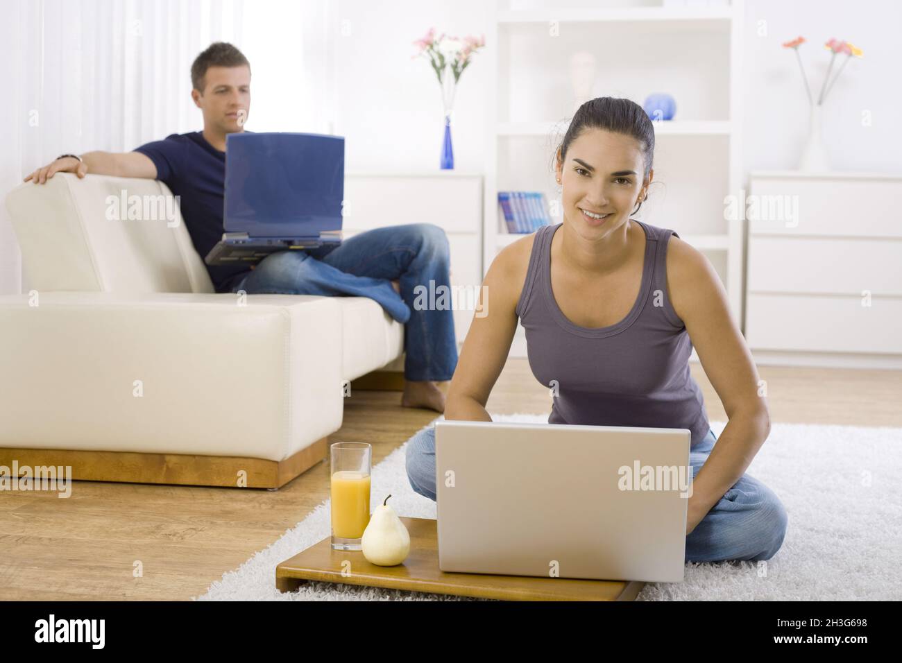 Joyous young woman using hi-res stock photography and images - Alamy