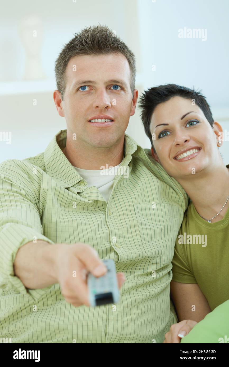 Couple watching TV Stock Photo - Alamy