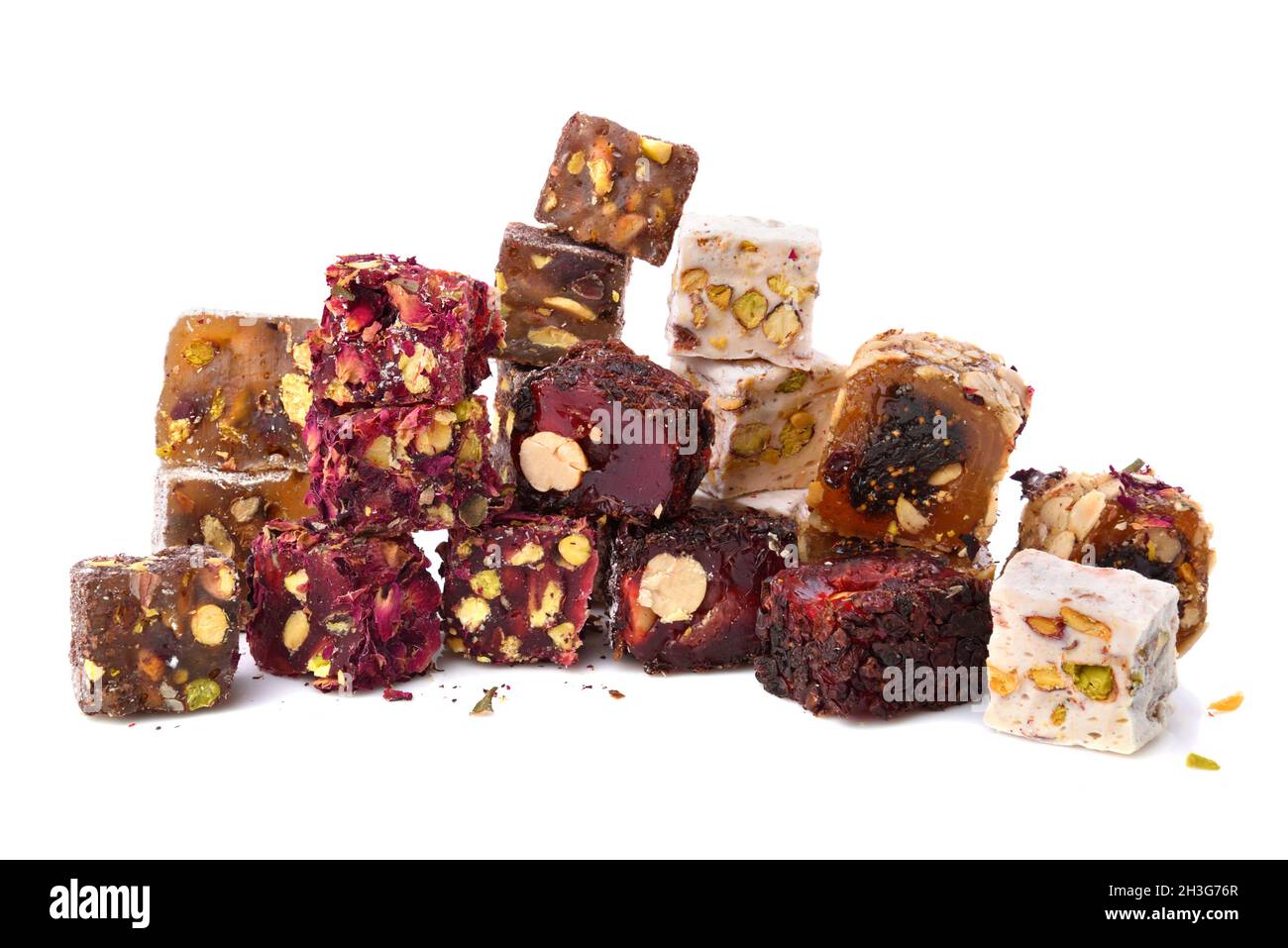 Assorted turkish delight rahat lokum with nuts and rose petals on a ...