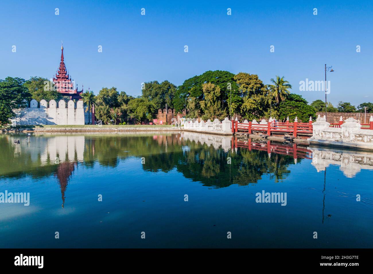 Moat, bridge, walls and a tower of Mandalay Fortress, Myanmar Stock ...