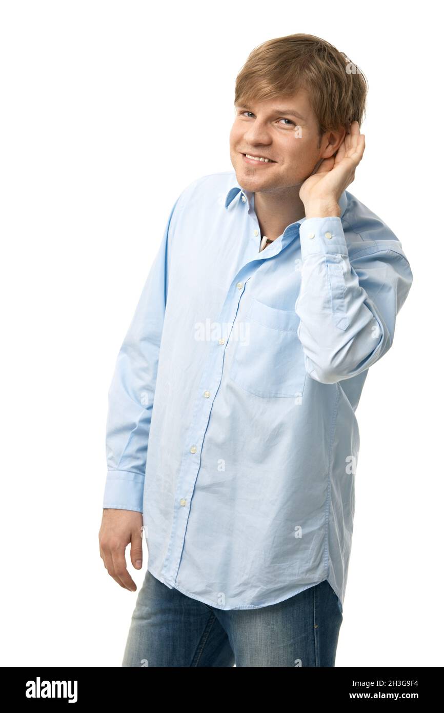 Young man listening Stock Photo - Alamy