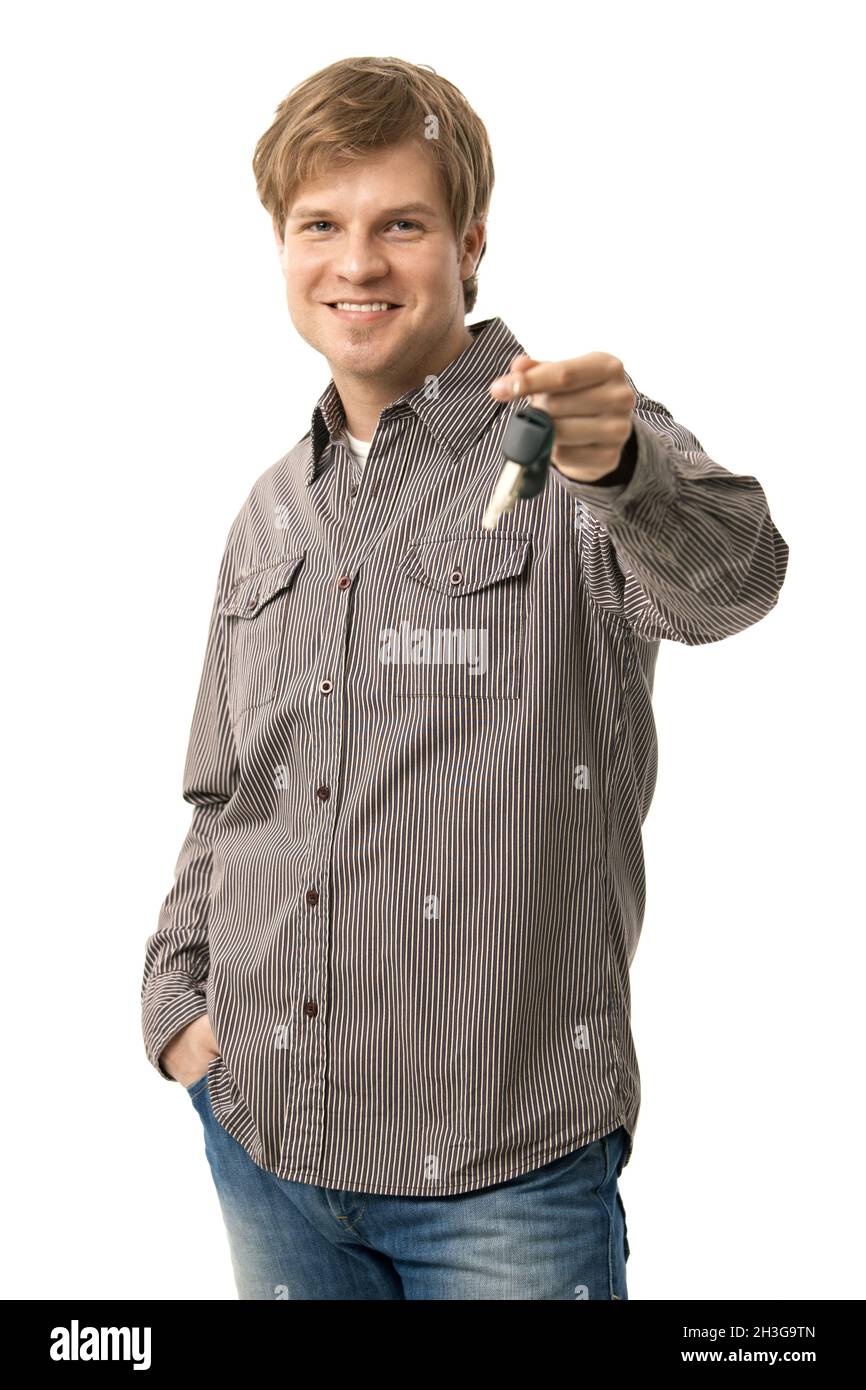 Young man holding ignition keys Stock Photo - Alamy