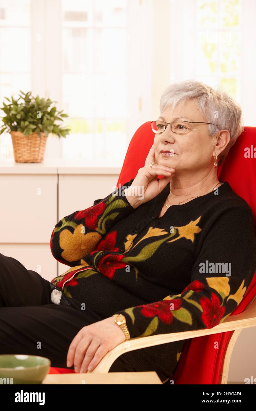 Senior woman thinking Stock Photo - Alamy