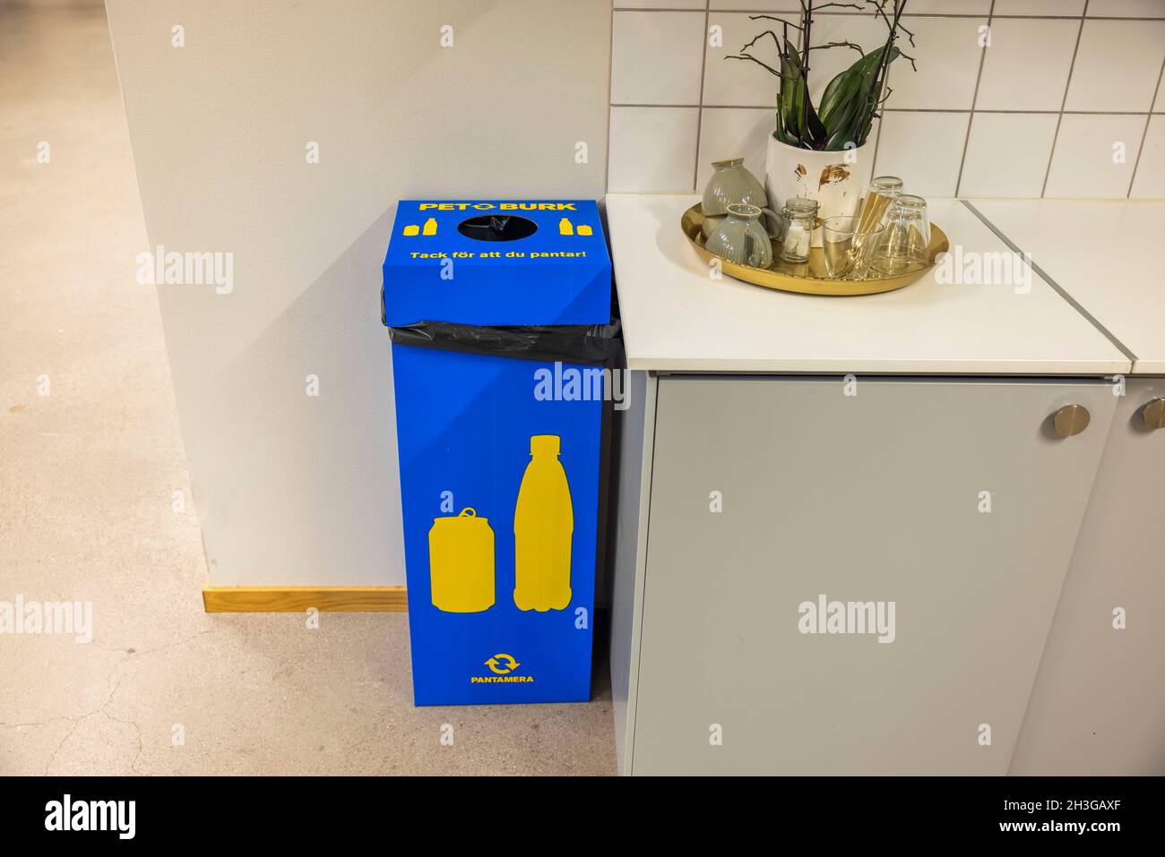 Close up view of recycling container for metal cans and plastic bottles ...