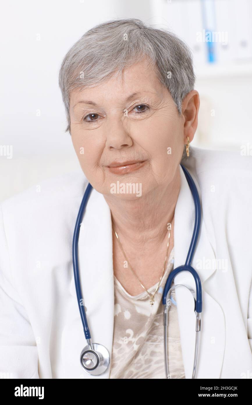 Portrait of senior female doctor Stock Photo - Alamy