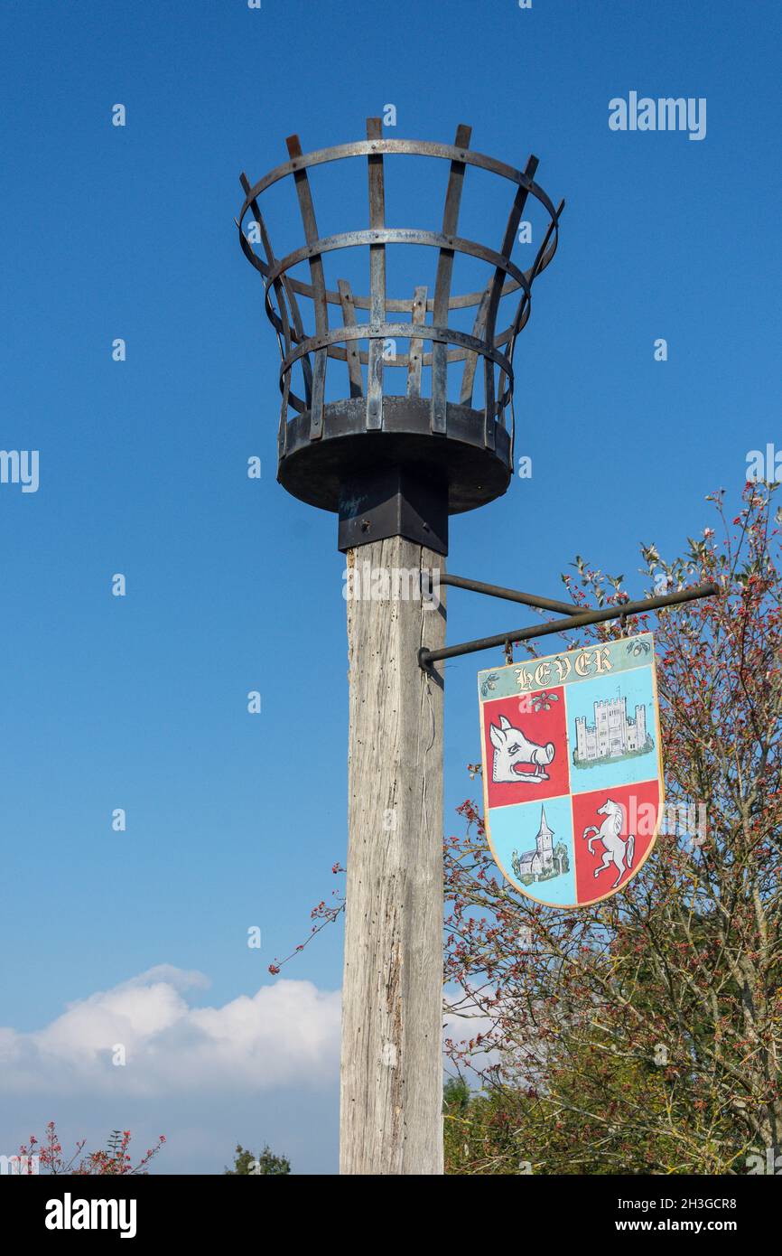 Fire basket with village sign, Hever Road, Hever, Kent, England, United ...