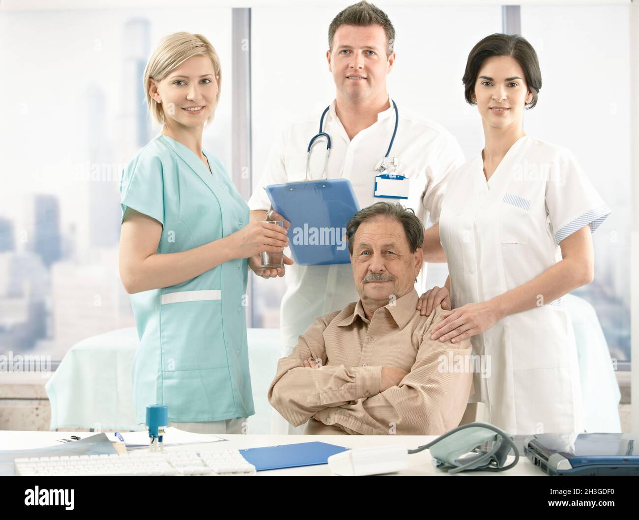 Senior patient and medical team Stock Photo - Alamy