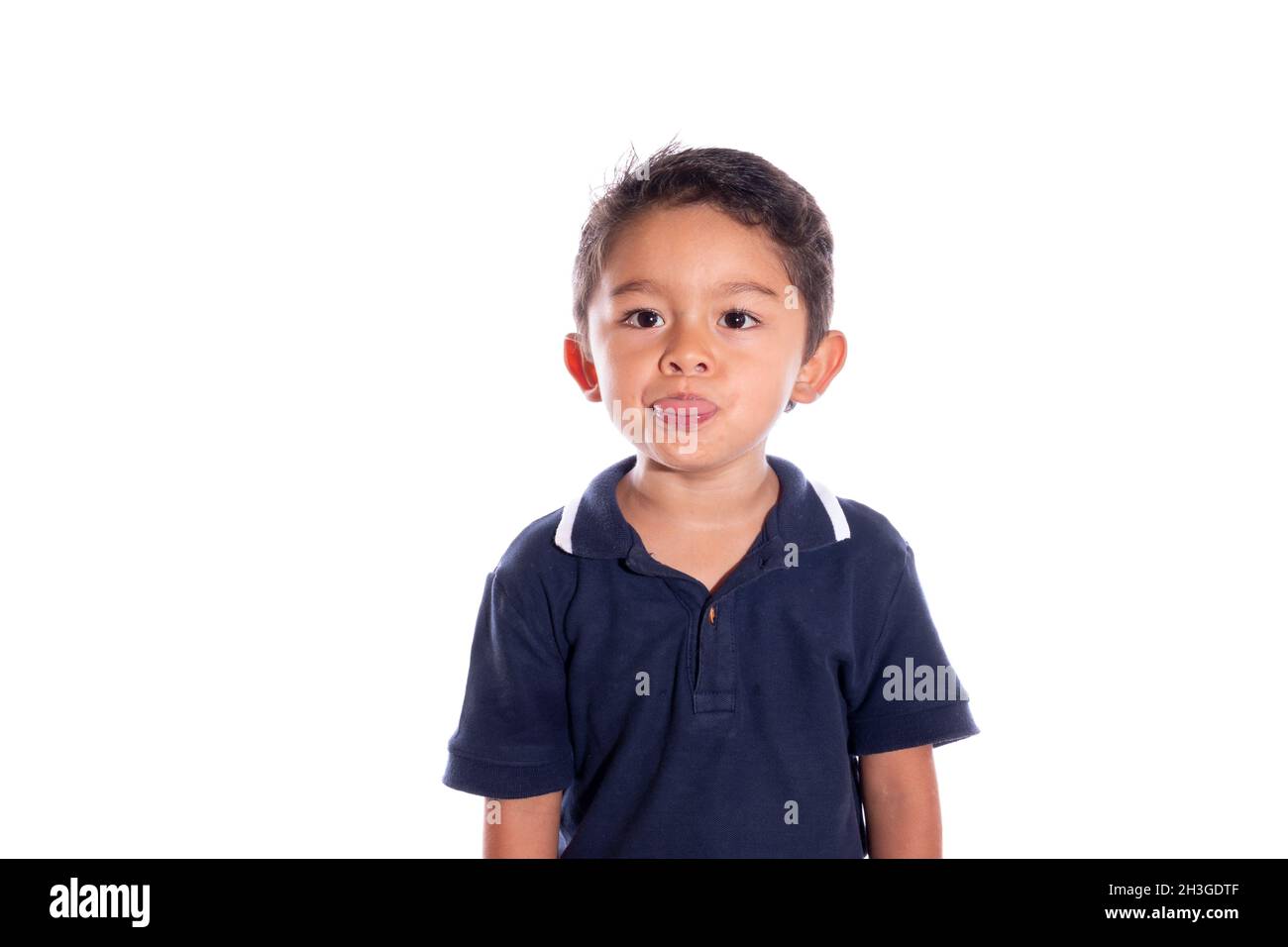 Child gesturing to camera, isolated on white background. Latin boy ...