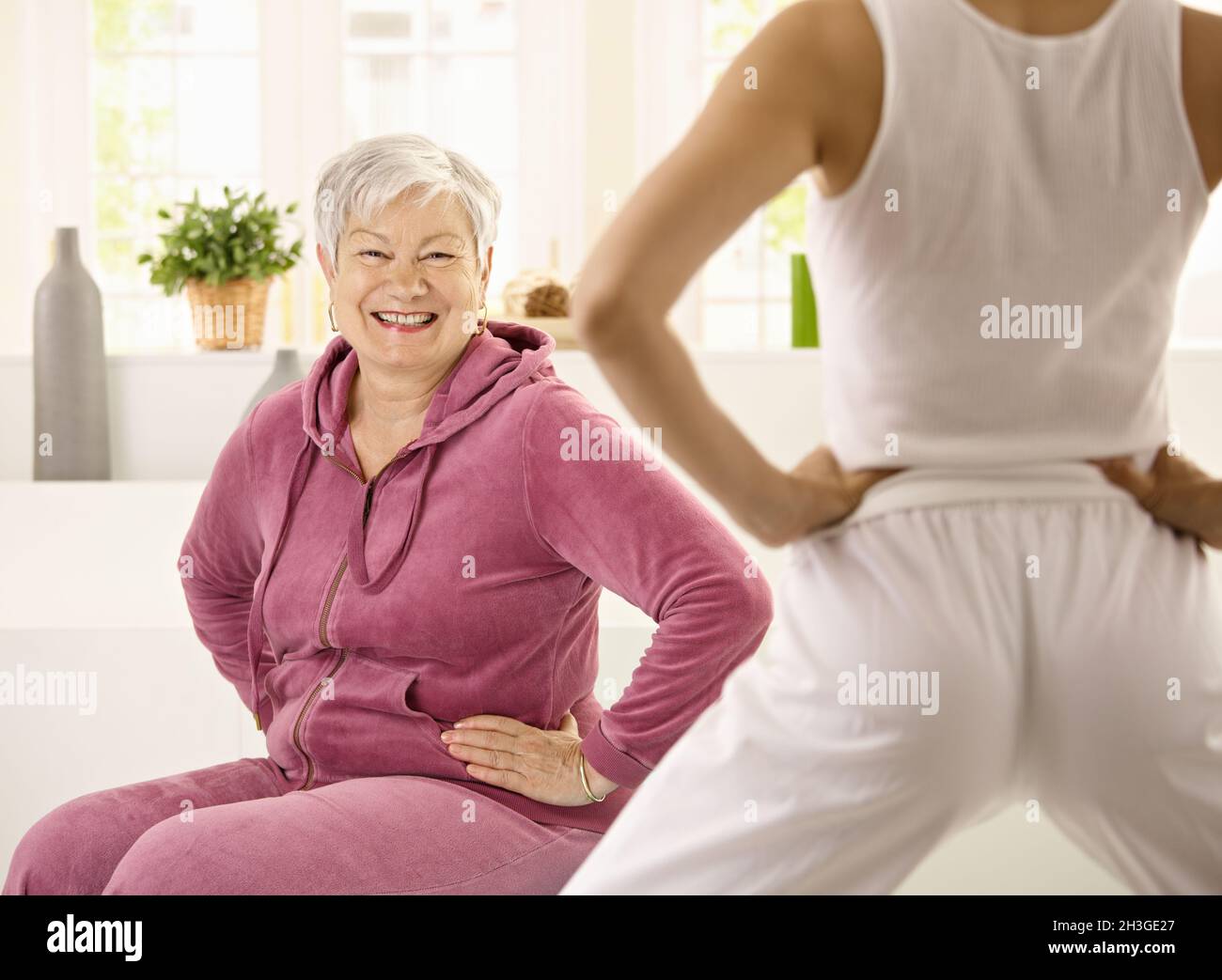 Woman older age training exercises hi-res stock photography and images ...