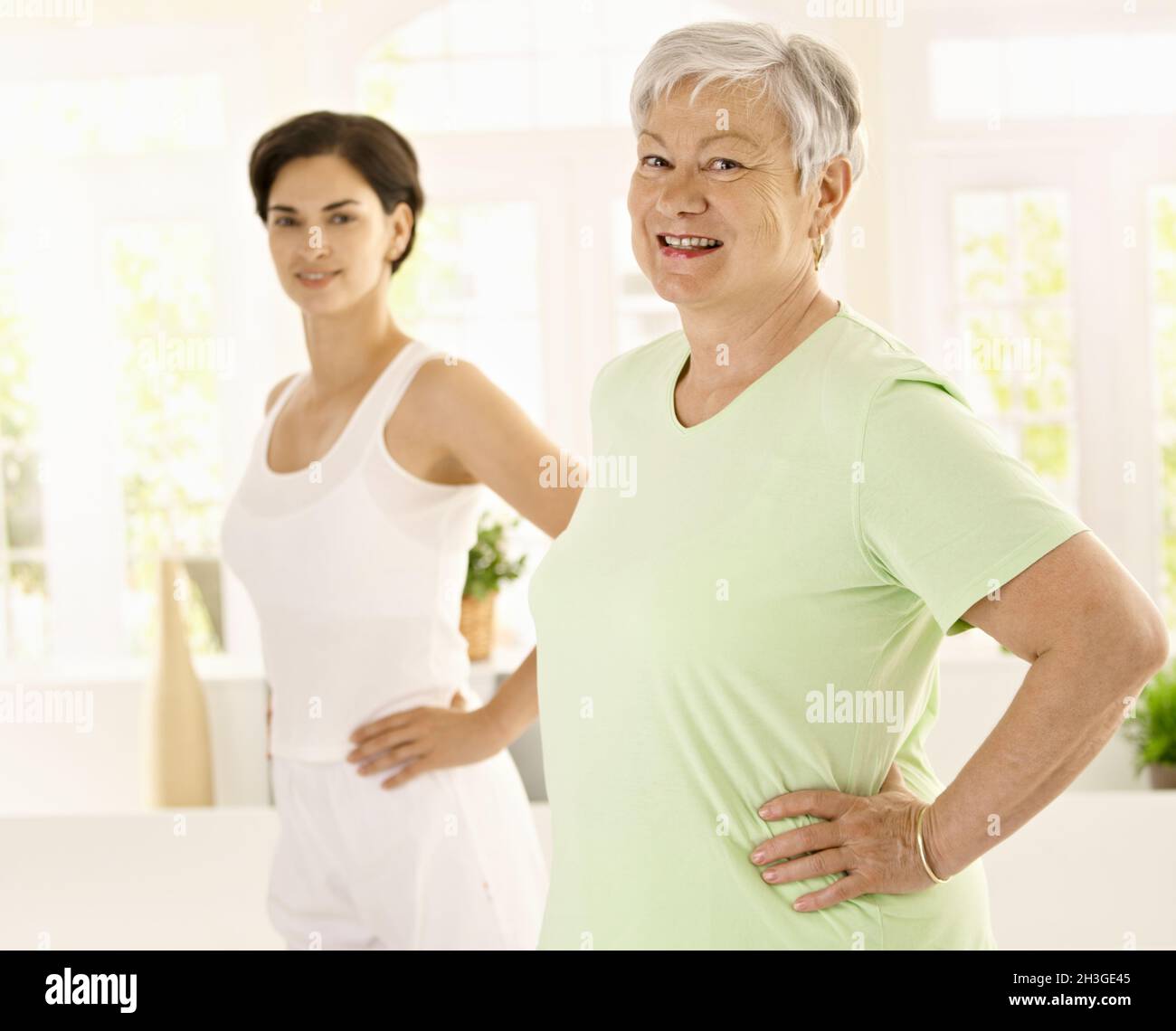 Mature woman exercises in home hi-res stock photography and images - Alamy