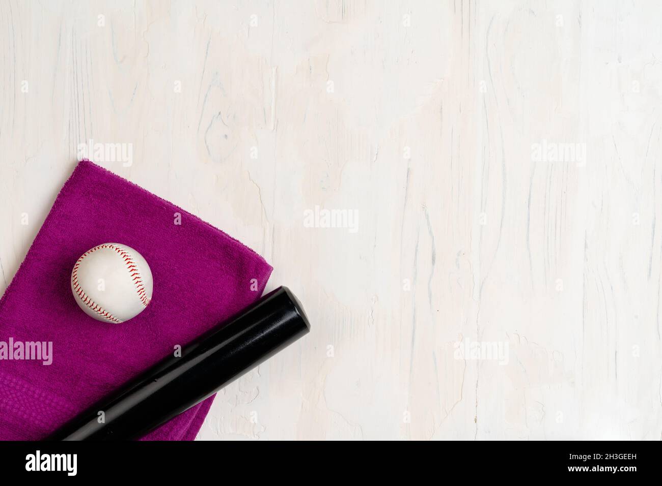 Baseball bat and ball, view from above Stock Photo - Alamy