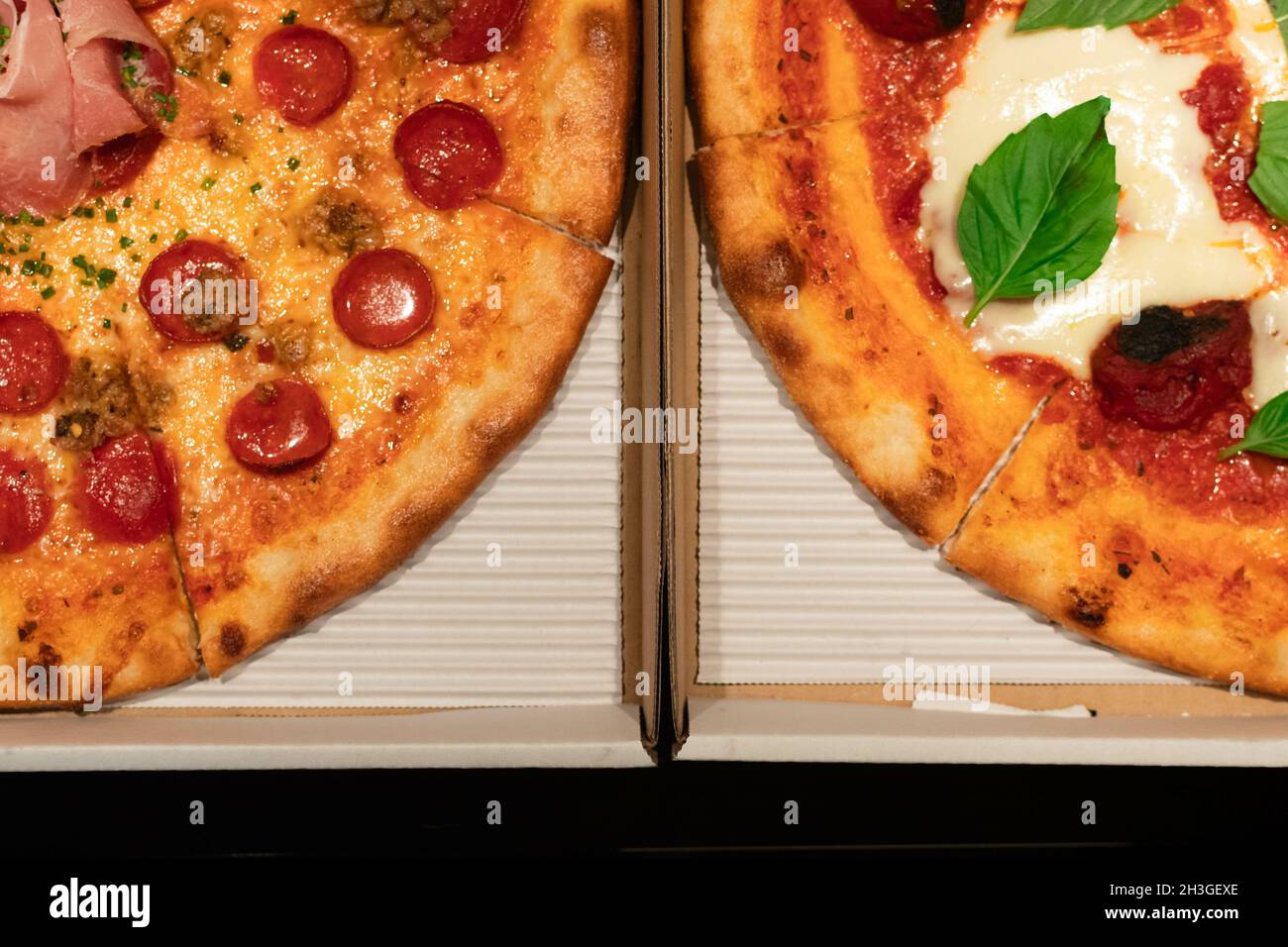 Two types of pizza hi-res stock photography and images - Alamy