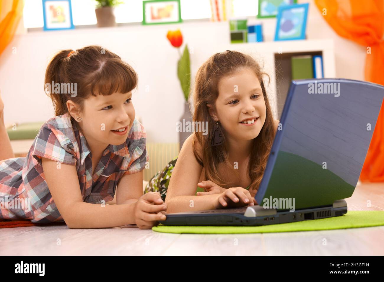 Children using computer at home Stock Photo - Alamy