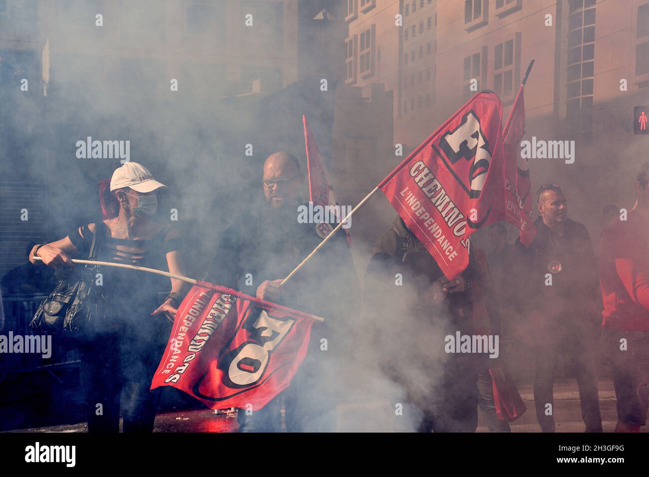 Protesters wave union flags during the demonstration. Called by French ...