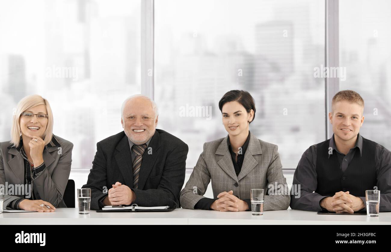 Formal businessteam portrait of generations Stock Photo - Alamy
