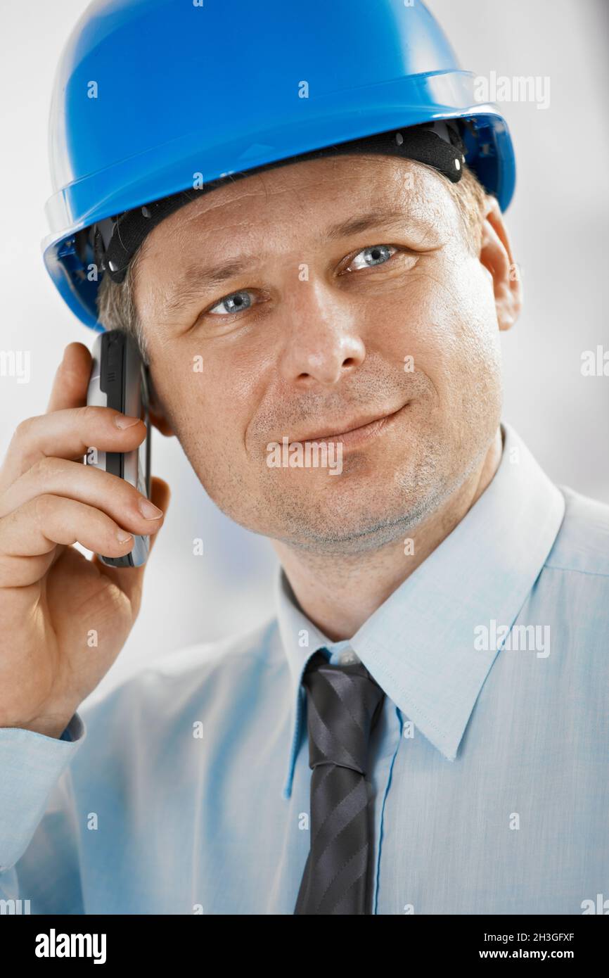 Portrait of architect with mobile Stock Photo - Alamy