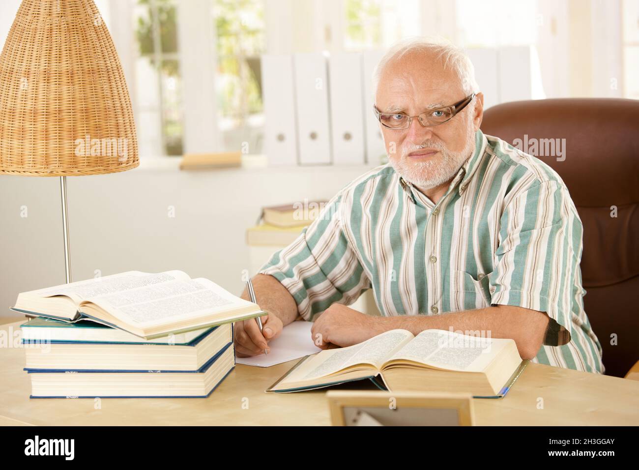 Retired man study hi-res stock photography and images - Alamy