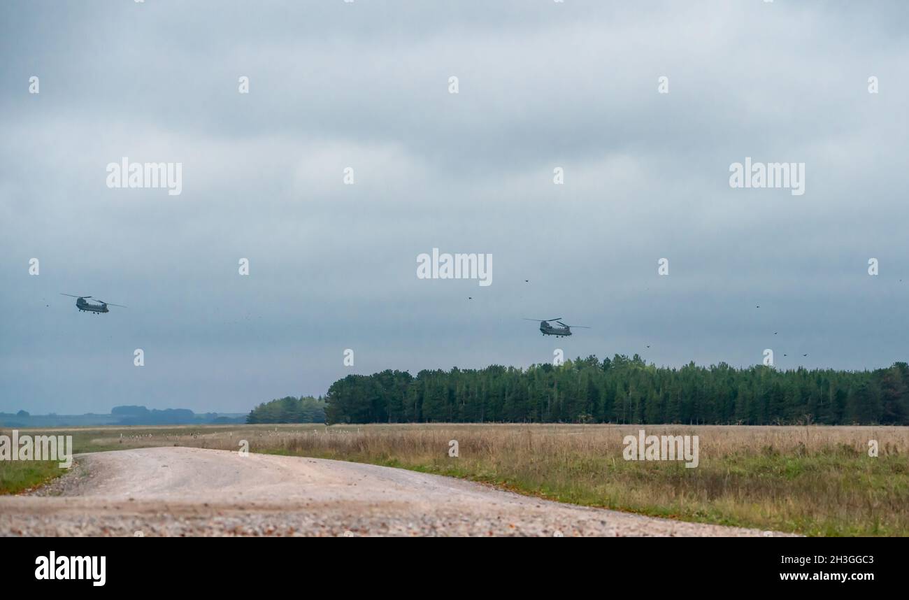 Helicopters flying cloudy sky air vehicle hi-res stock photography and ...