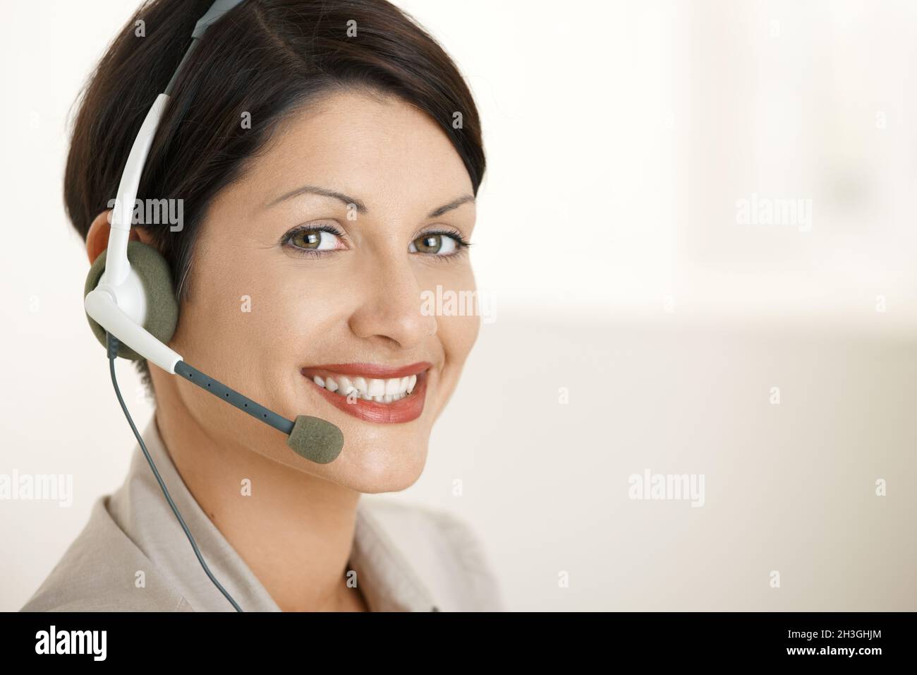 Happy customer service operator Stock Photo - Alamy
