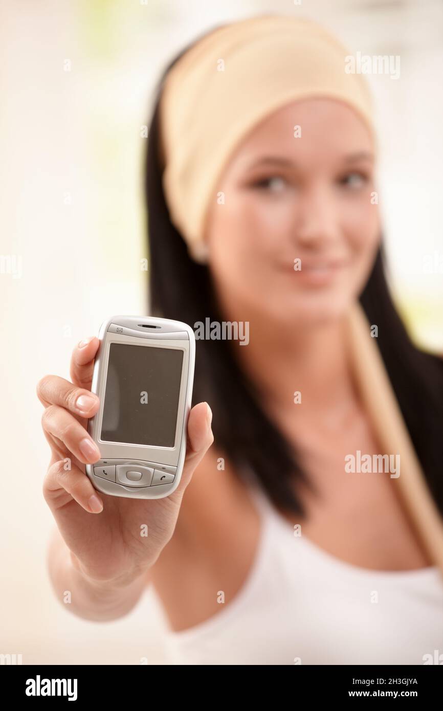 Mobile phone handheld in focus Stock Photo - Alamy