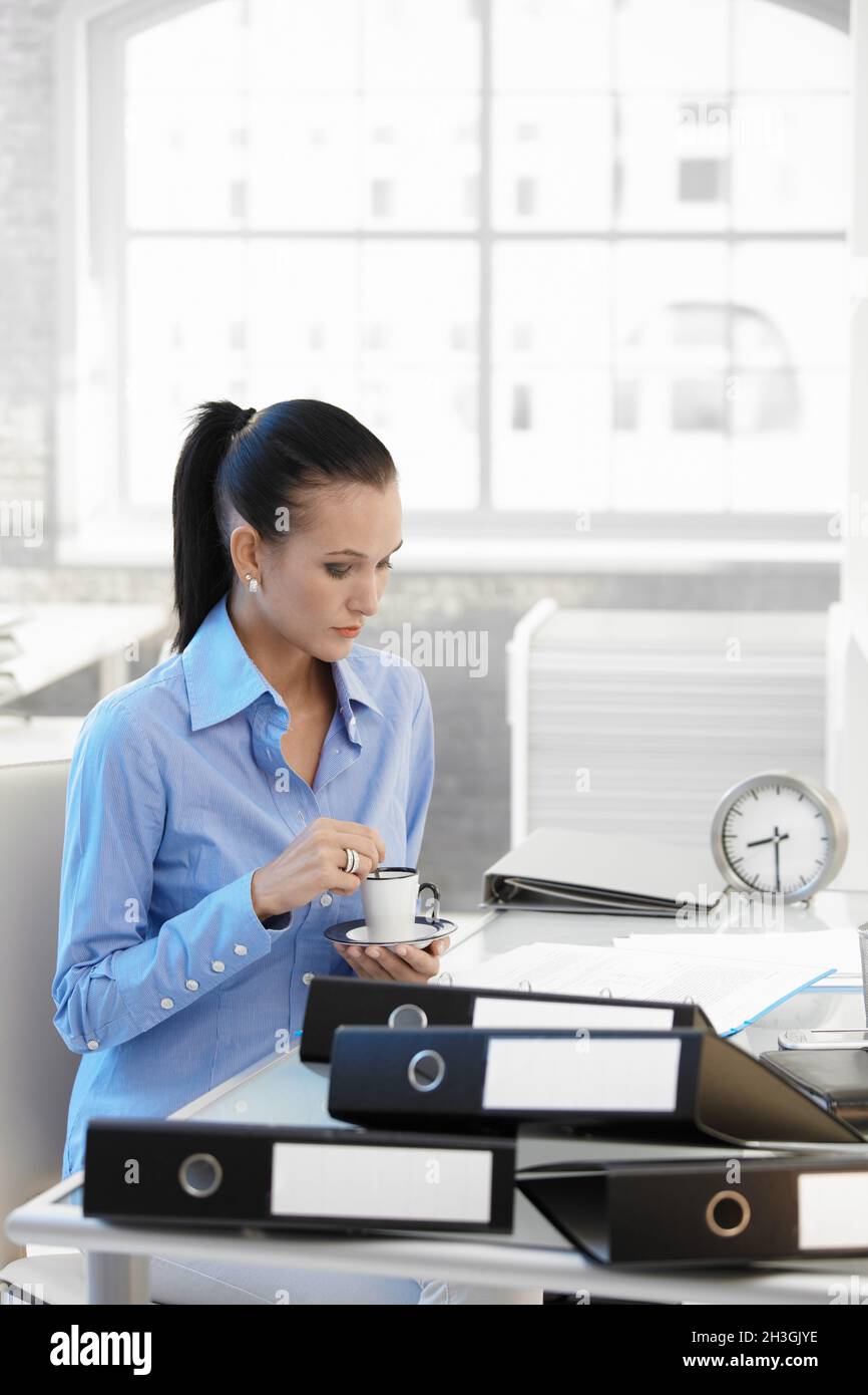 Businesswoman desk breaking cup hi-res stock photography and images - Alamy