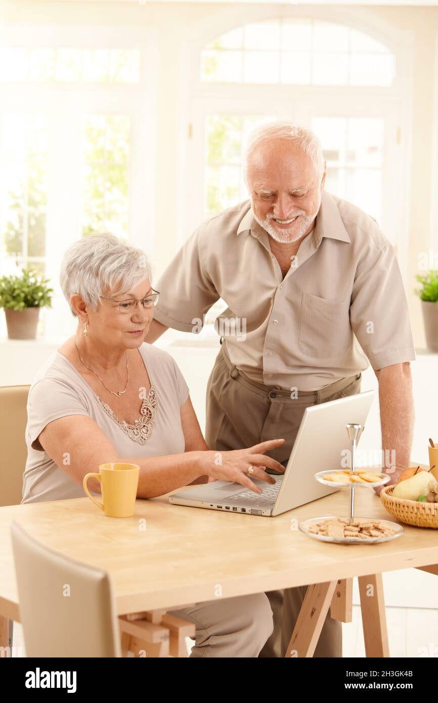 Old couple using face hi-res stock photography and images - Alamy