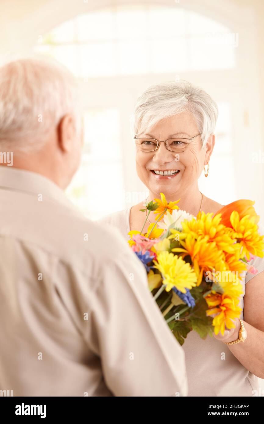 Old lady getting flowers hi-res stock photography and images - Alamy