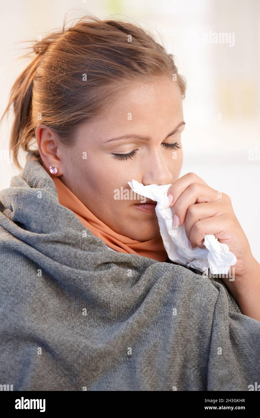 Young woman caught cold feeling bad Stock Photo - Alamy