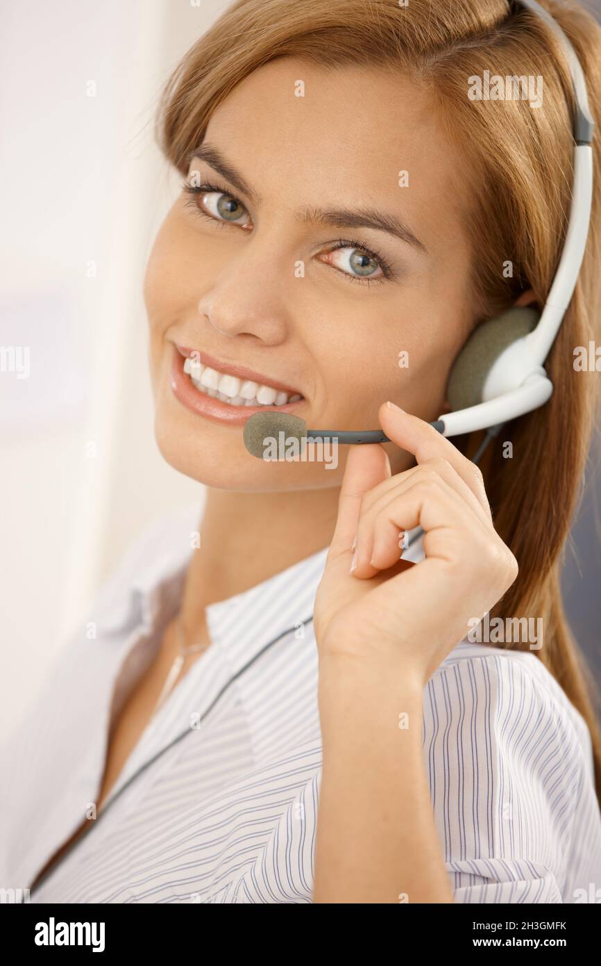 Portrait of confident call center girl Stock Photo - Alamy