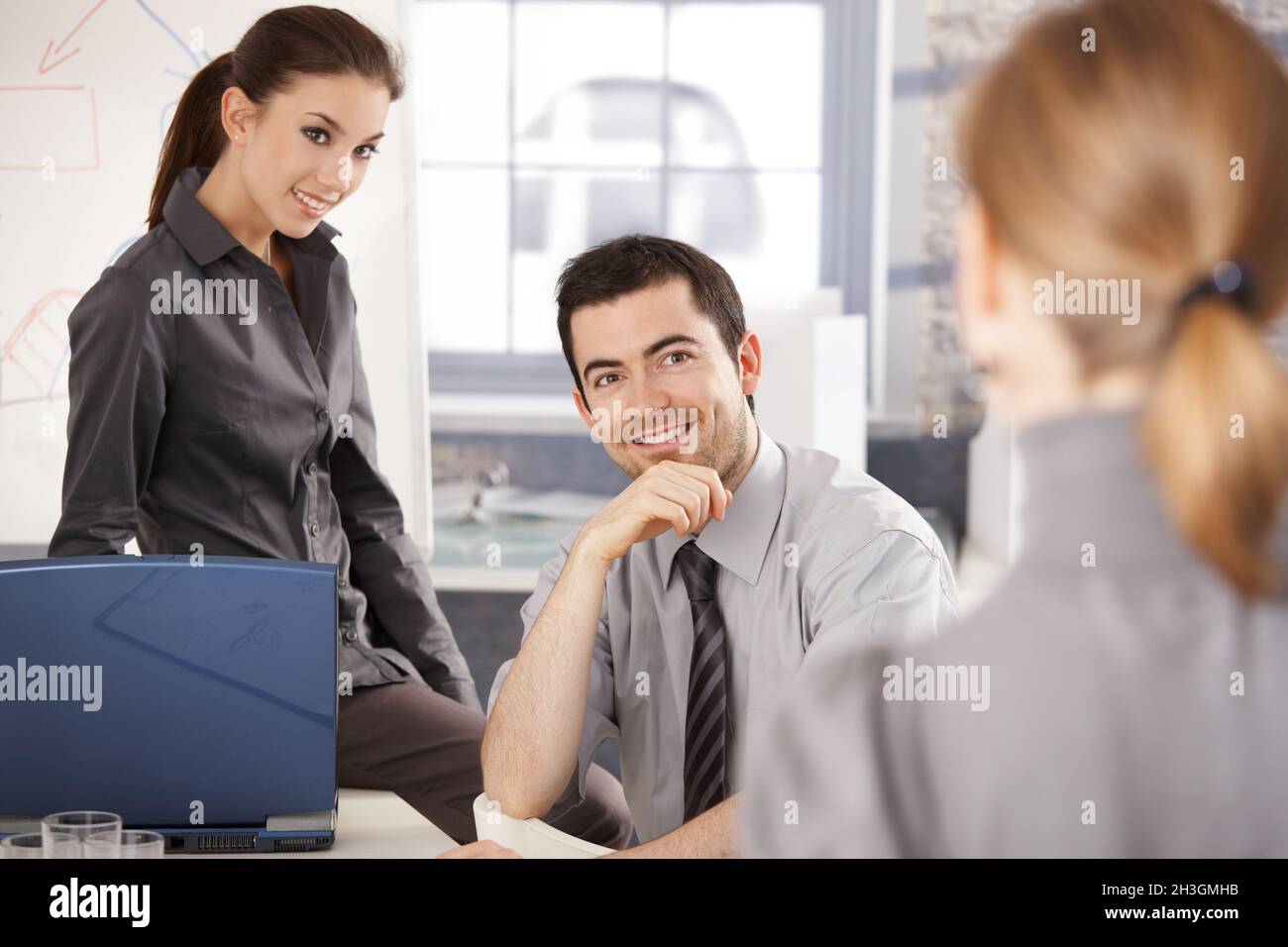 Happy businesspeople working together hi-res stock photography and ...