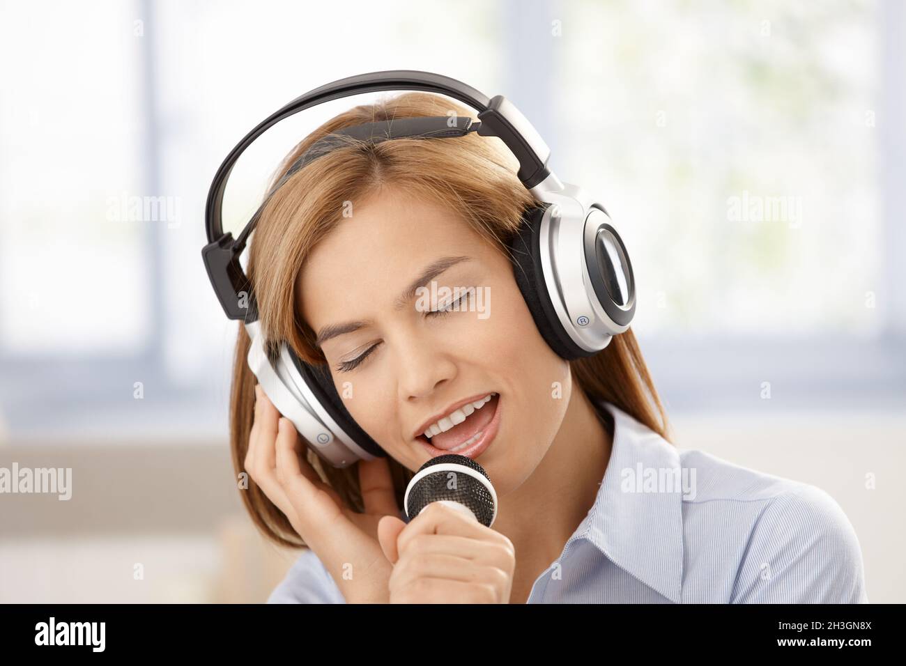 Joyous singing hi-res stock photography and images - Alamy