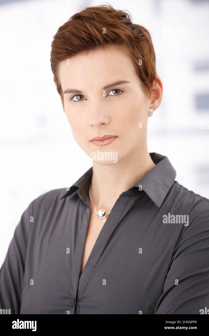 Serious trendy ginger woman looking hi-res stock photography and images ...