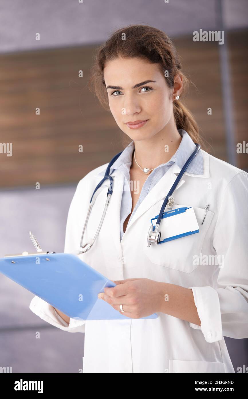Portrait of young female doctor in modern hospital Stock Photo - Alamy