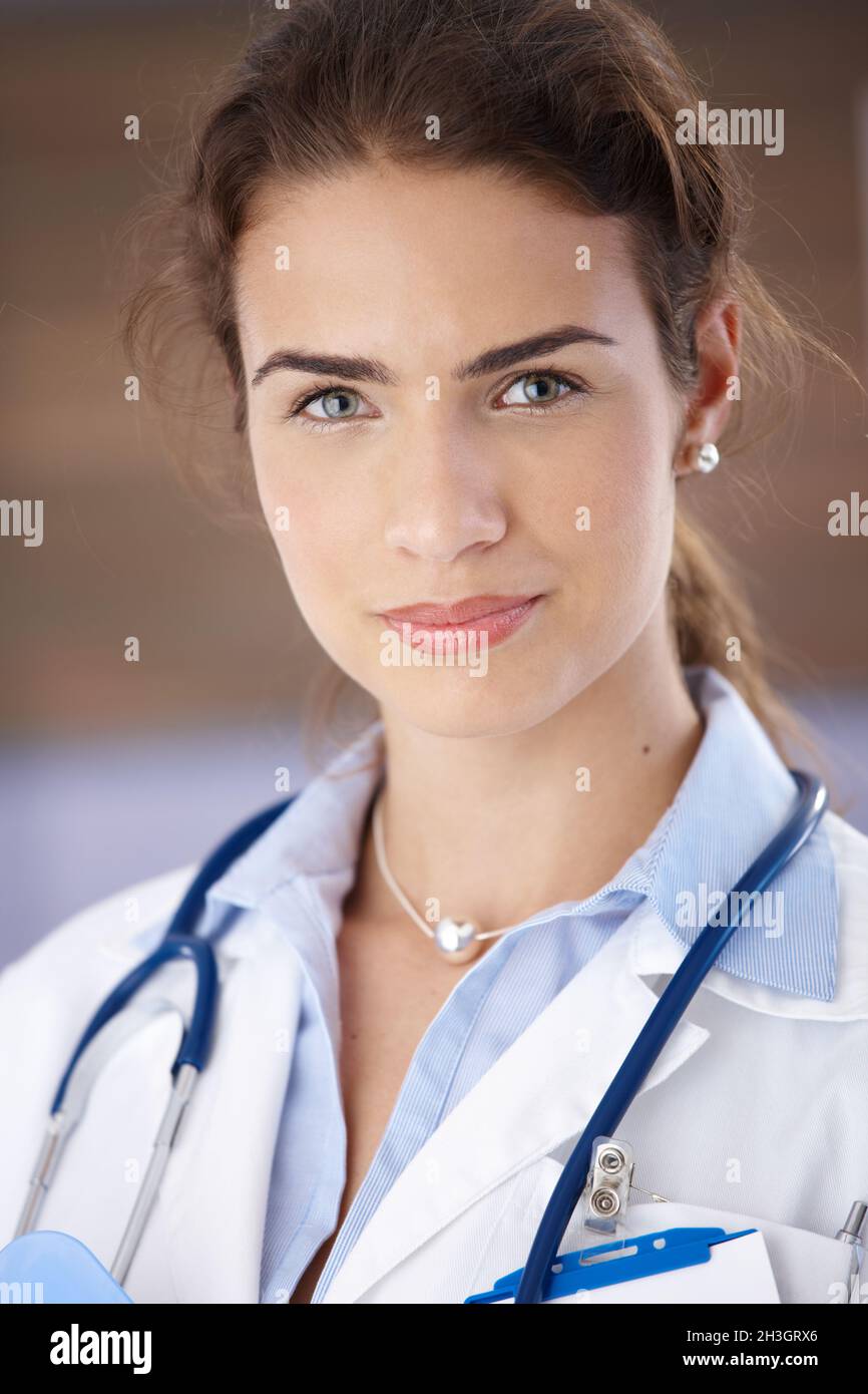 Vertical young female doctor hi-res stock photography and images - Alamy