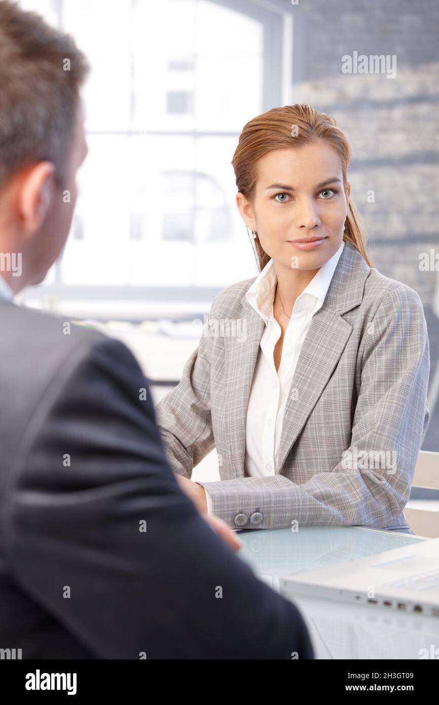 Attractive woman during job interview Stock Photo - Alamy