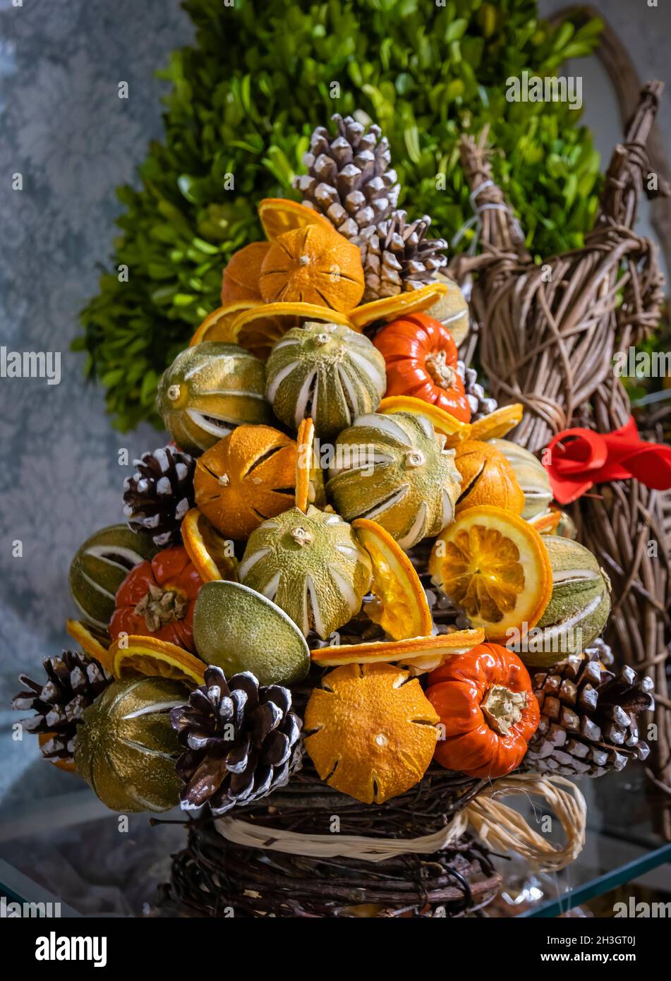 Ornamental seasonal festive display made with dried citrus fruits in ...