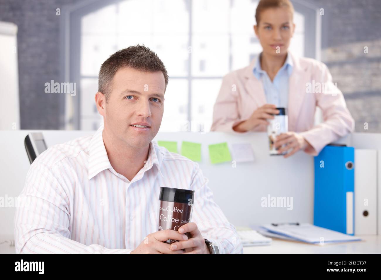Casual office workers having break Stock Photo - Alamy