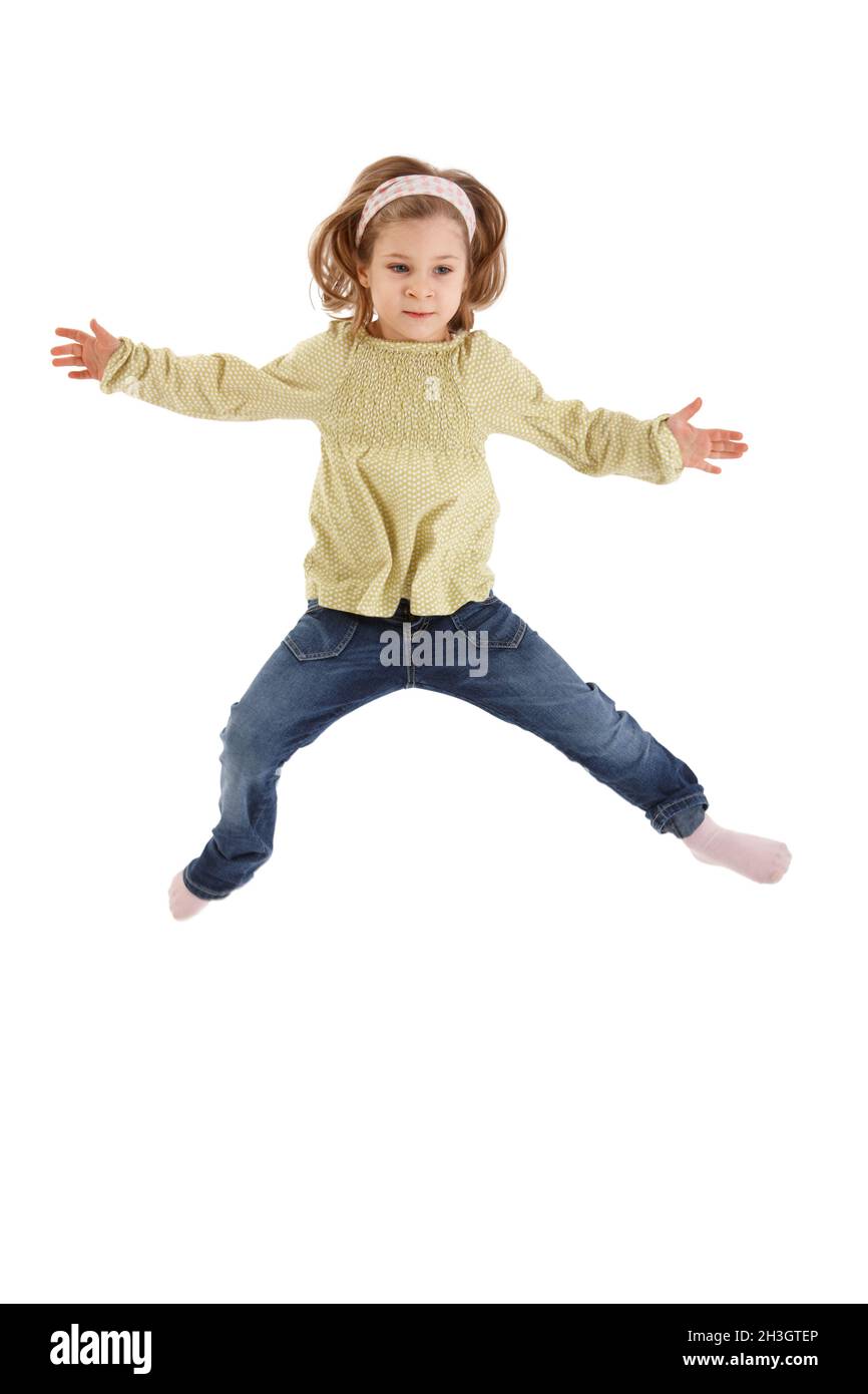 Little girl jumping Stock Photo - Alamy