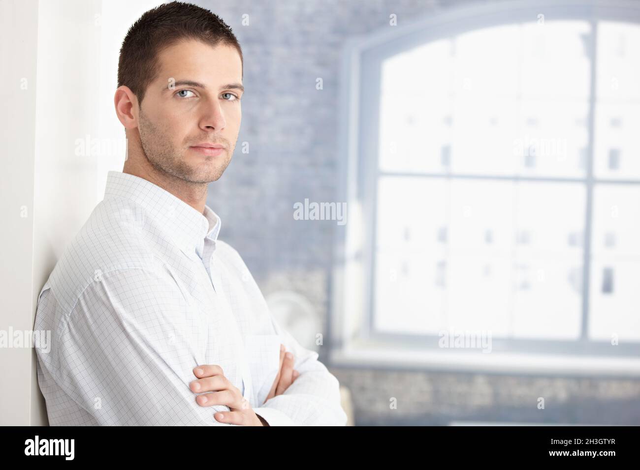Arms crossed standing handsome hi-res stock photography and images - Alamy