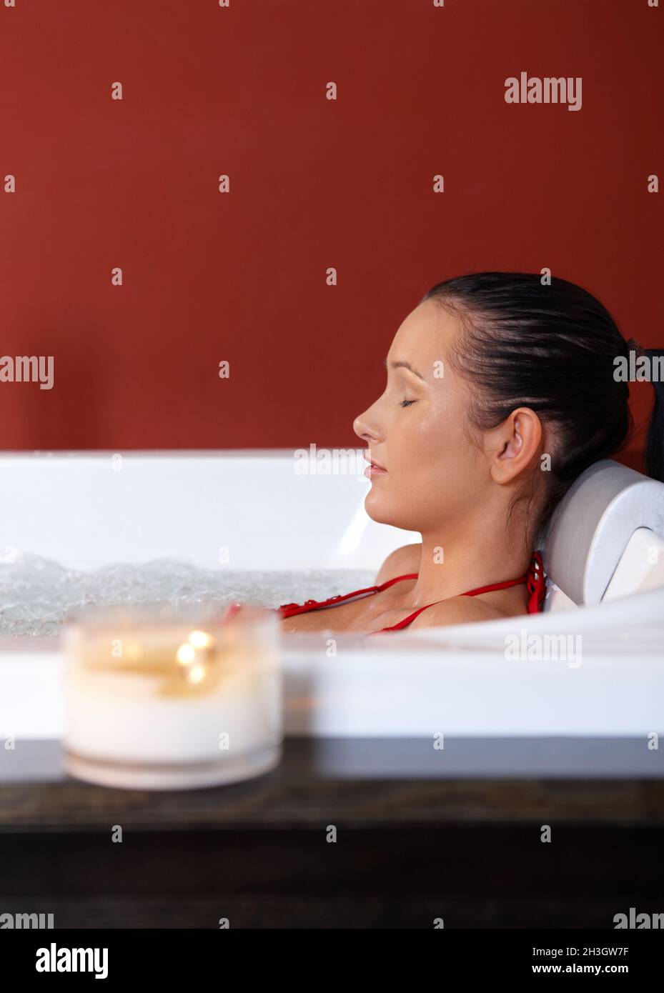 Portrait of woman in jacuzzi Stock Photo - Alamy