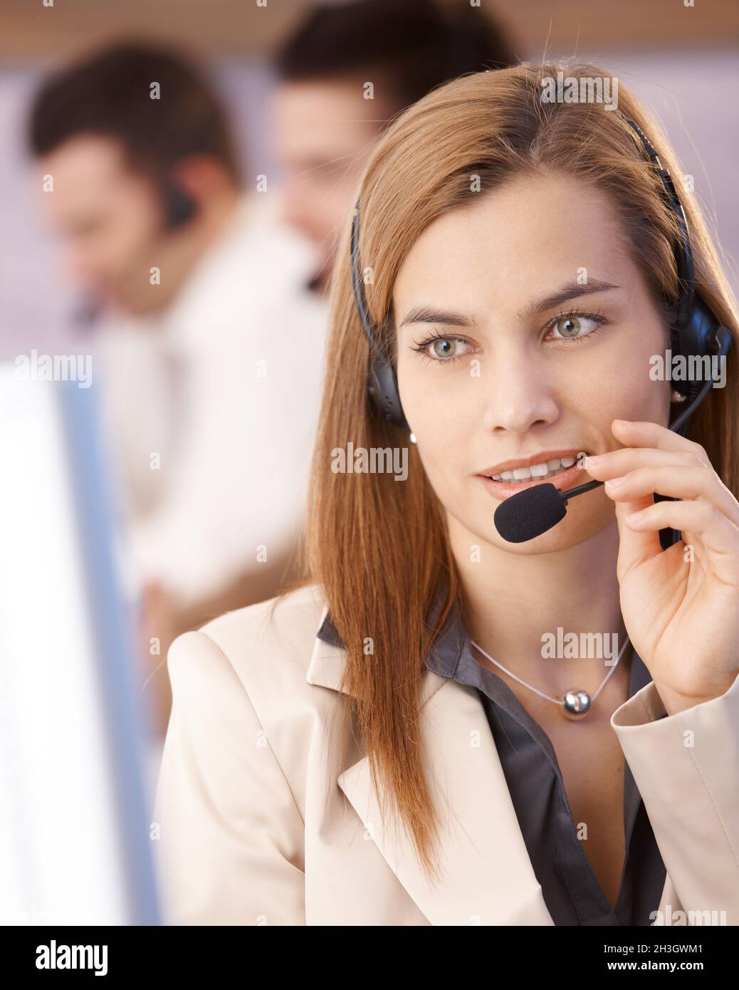 Portrait of attractive female dispatcher smiling Stock Photo - Alamy