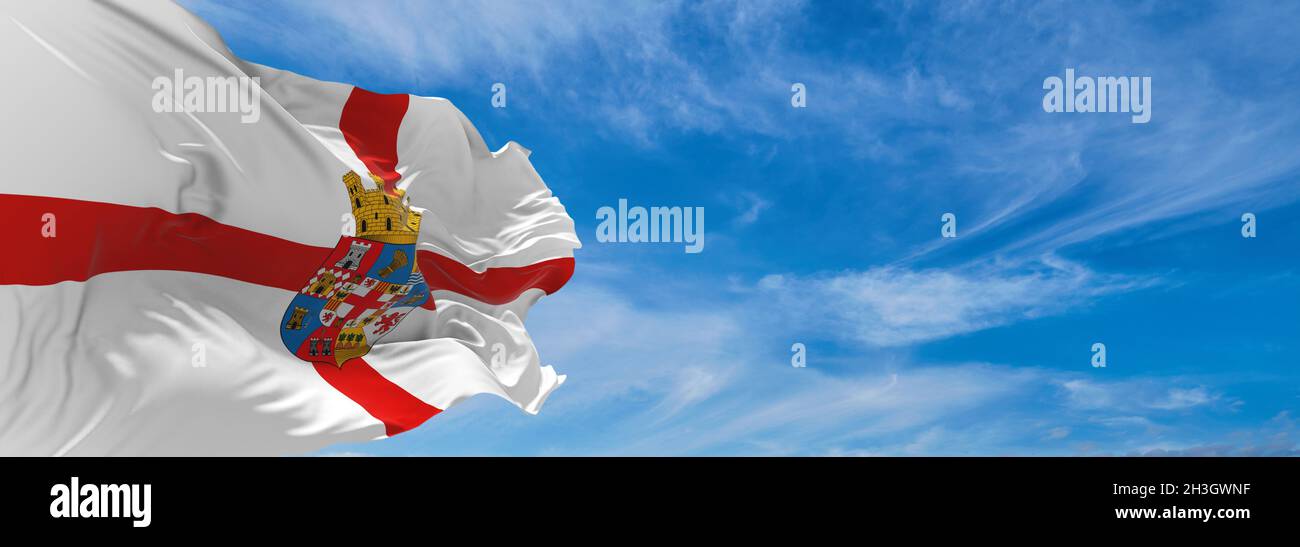 flag of Almeria Province , Spain at cloudy sky background on sunset ...